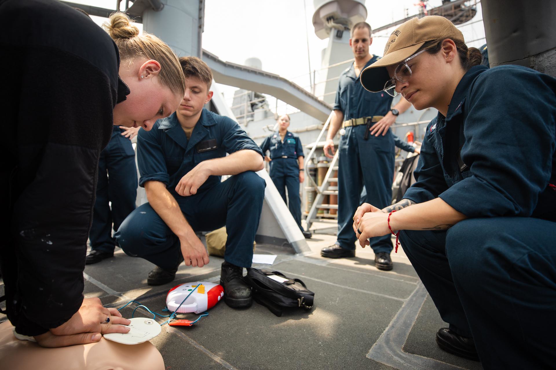 Beaver native performs chest compressions on a practice dummy aboard ...